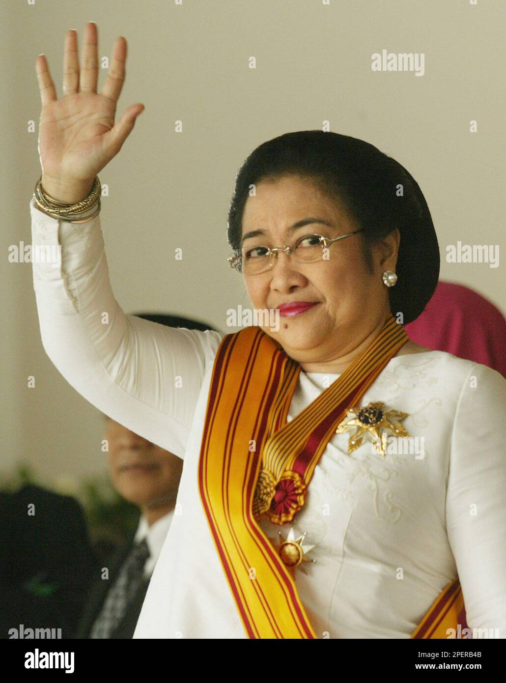 Indonesia's President Megawati Sukarnoputri waves during the ...