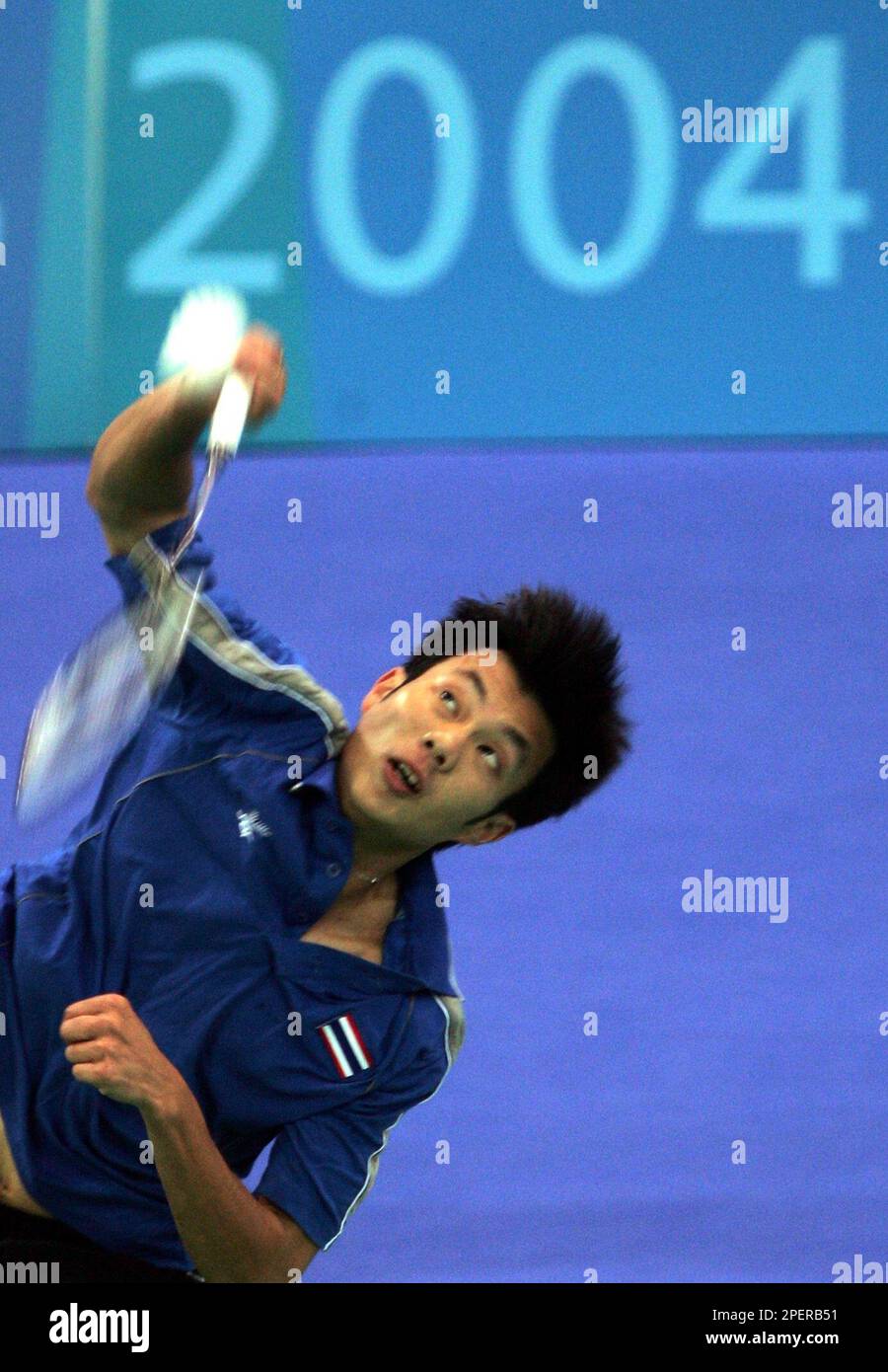 Boonsak Ponsana of Thailand's returns the shuttlecock againts Lee Hyun ...