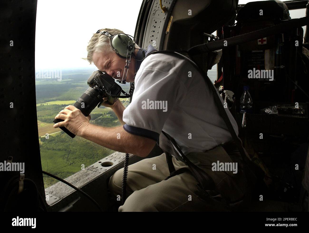 North Carolina Gov. Mike Easley takes photographs of southeastern North ...