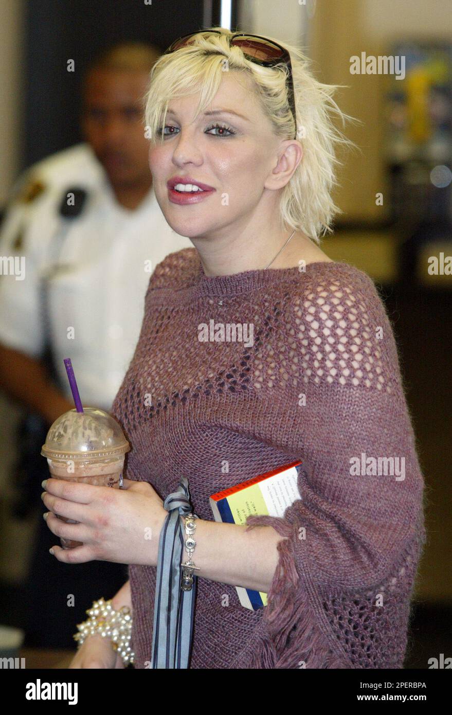 Actress/singer Courtney Love arrives for her arraignment at Beverly ...