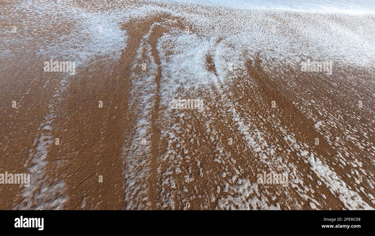 Surf and sand Stock Photo - Alamy