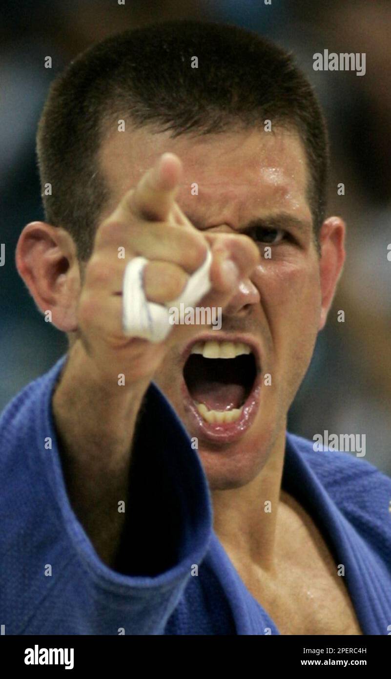 James Pedro, of the United States, celebrates after defeating France's ...