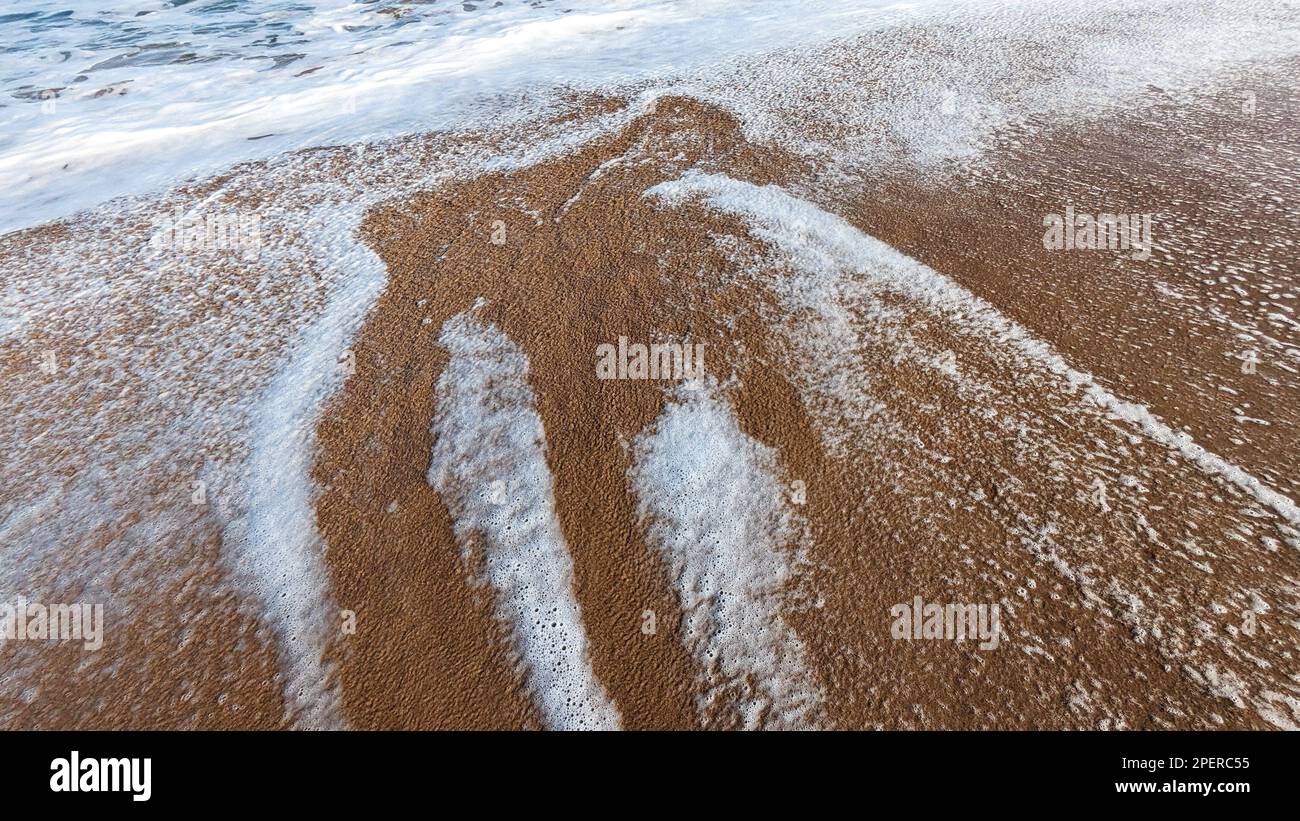 Surf and sand Stock Photo - Alamy