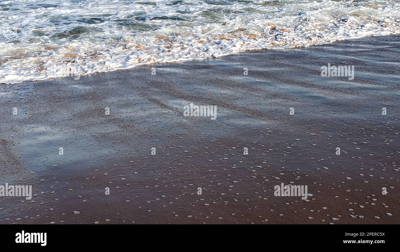 Surf and sand Stock Photo - Alamy