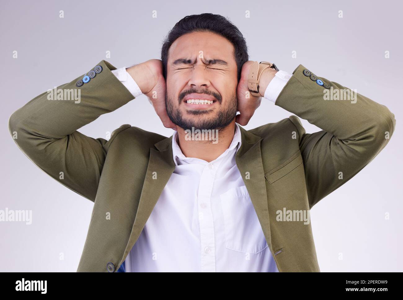 Business, stress and Asian man cover ears, loud and mental health ...