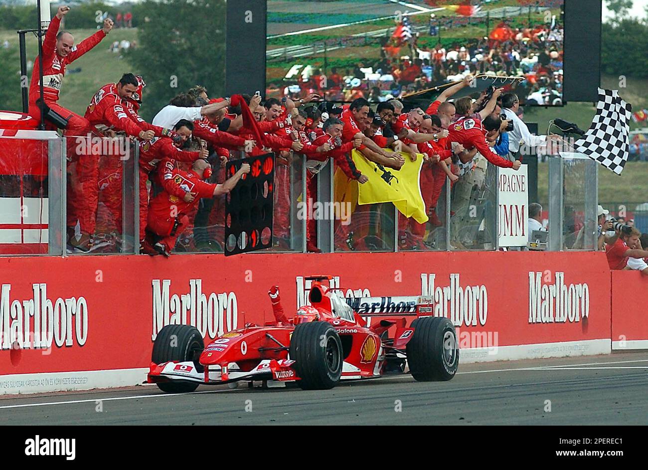 Ferrari's German F1 driver Michael Schumacher raises his fist to ...
