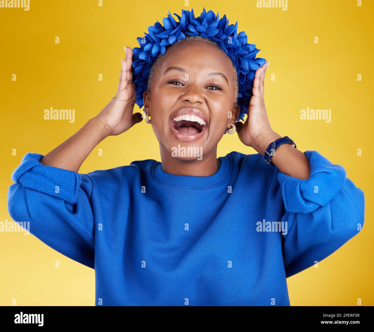 Portrait, queen and flower crown with an excited black woman in studio ...