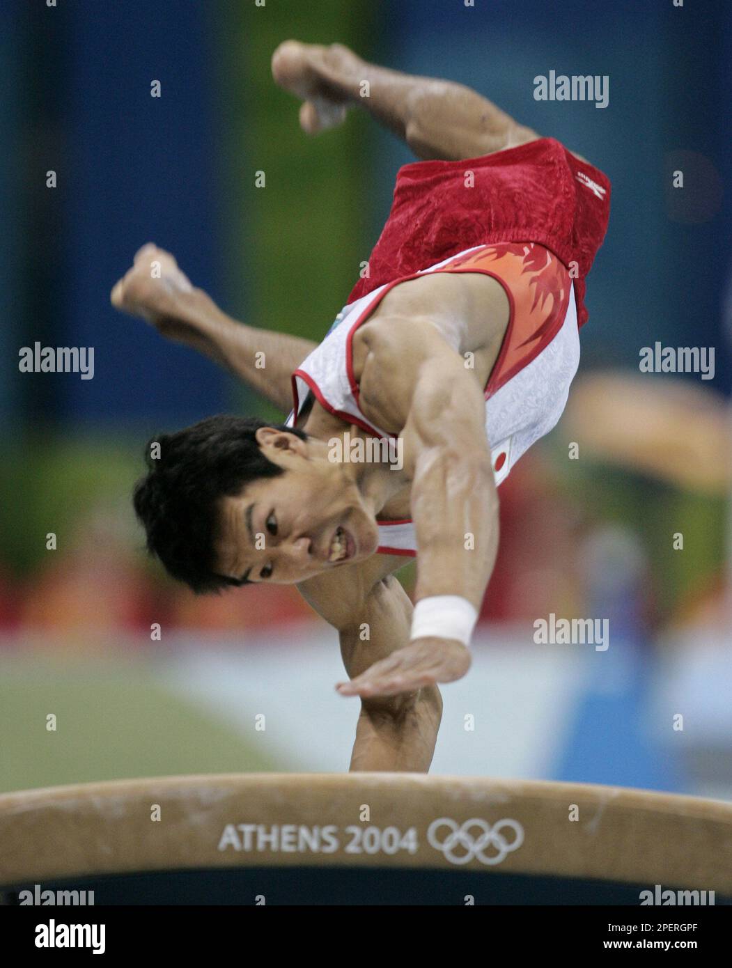 Japan's Mizutori Hisashi competes in the vault during men's gymnastics ...