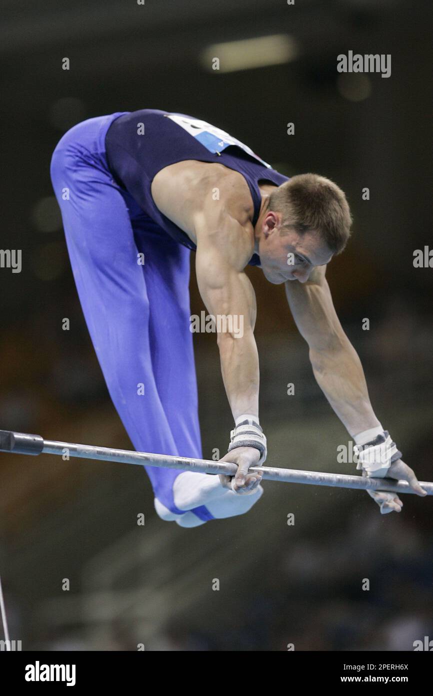 Israel's Runar Alexandersson performs his routine on the high bar ...
