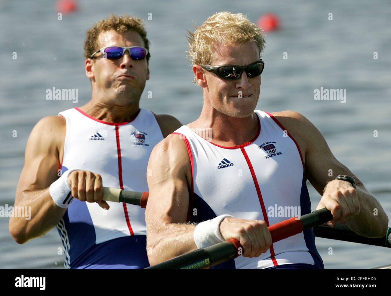 Toby Garbett, left, and Rick Dunn of Great Britain strain during their ...