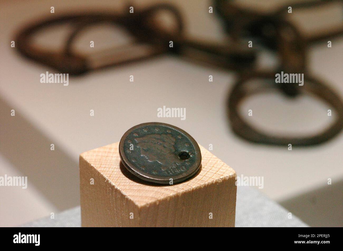 ** ADVANCE FOR SUNDAY AUG. 15 ** A slave coin, shown Aug. 12, 2004 ...