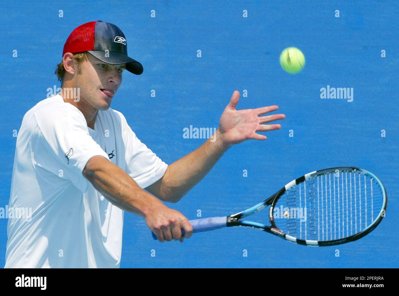 American player Andy Roddick hits the ball whilst practicing for the ...
