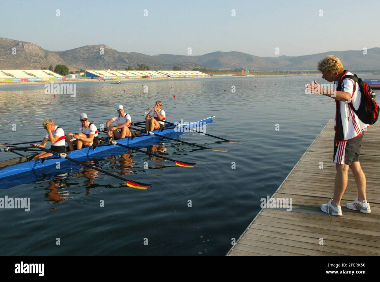 Coach Jutta Lau, right, gives advice to the German Women's Quad Scull ...
