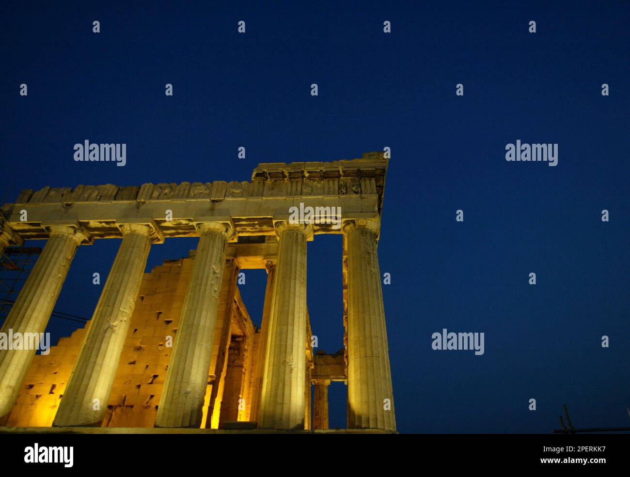 The ancient Parthenon temple on the Acropolis hill, is lit following ...