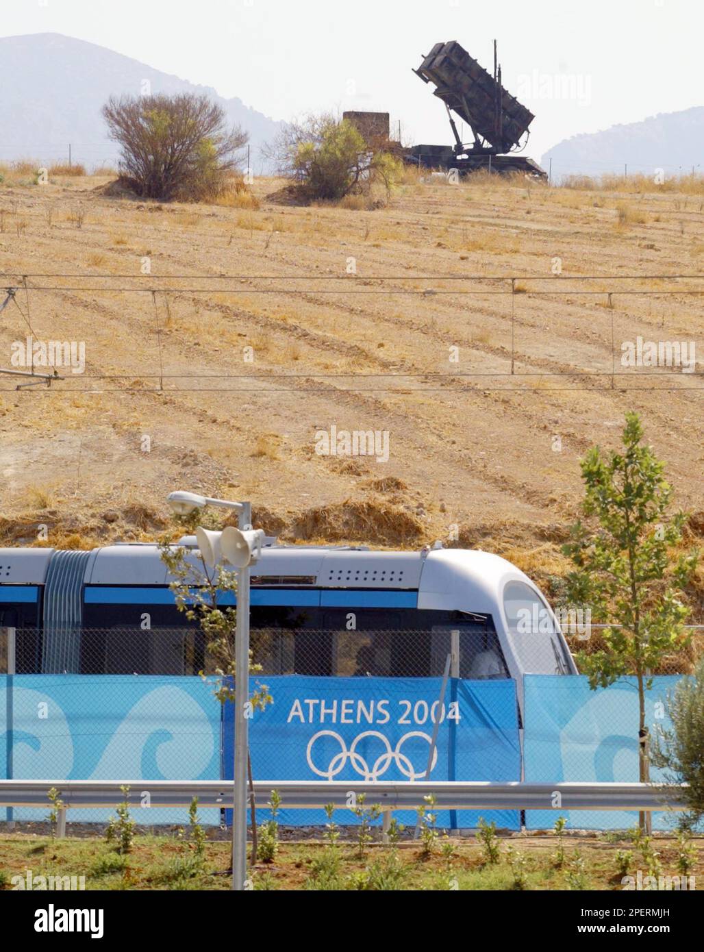 A missile defense battery is seen above an Olympic venue as a light ...