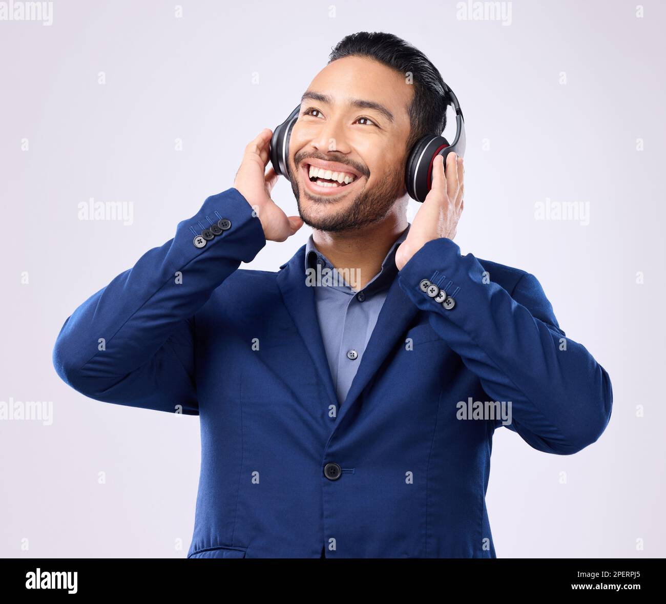 Executive man, music headphones and thinking on studio background of ...