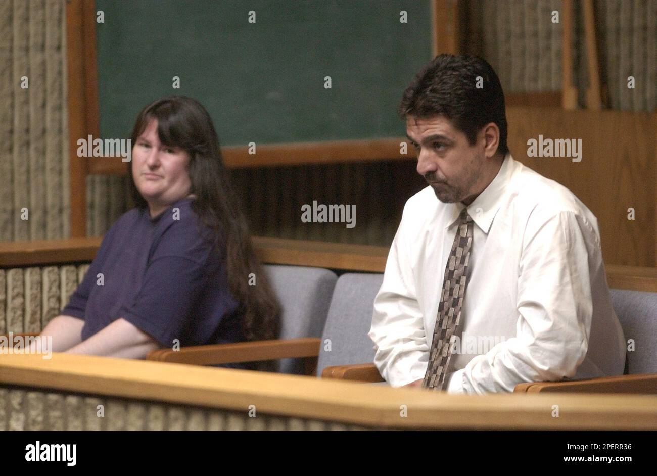 Defendants Mary Jean Armstrong, left, Richard Lapham listen to Sgt ...