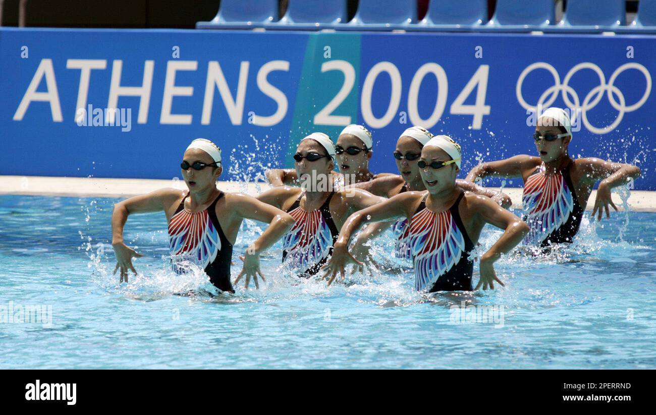 The Japanese synchronized swimming team practise at the Olympic Aquatic ...