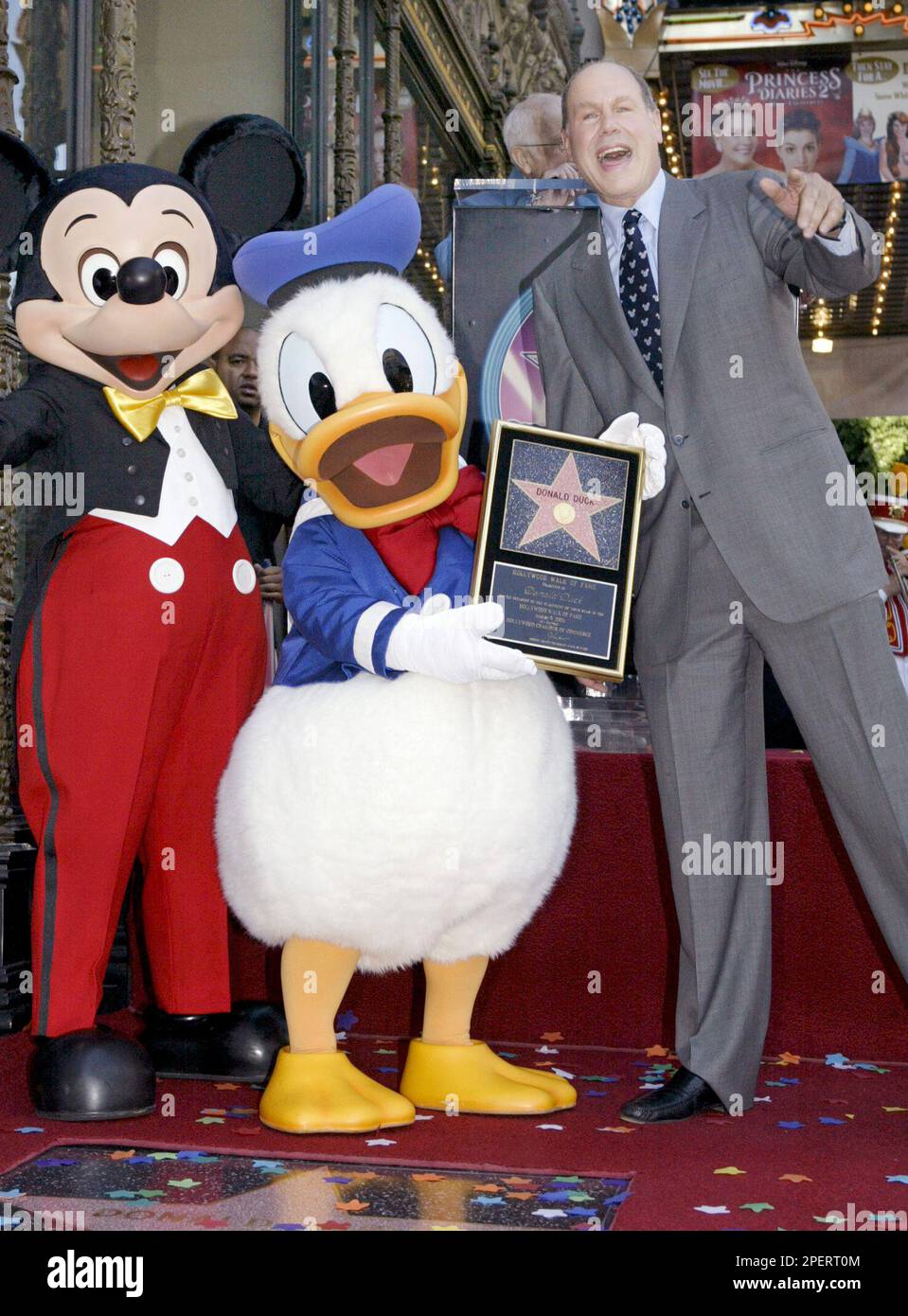 Michael Eisner, CEO of the Walt Disney Company, right, celebrates with ...