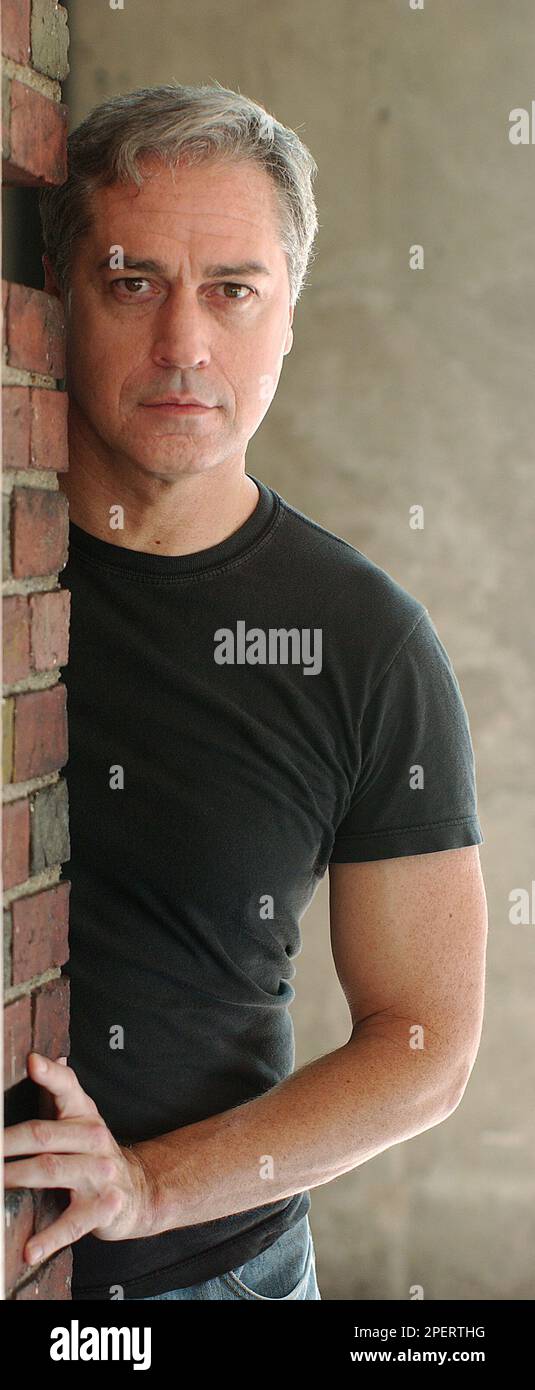 Actor Tom Hewitt poses outside the Belasco Theater in New York Aug. 4 ...