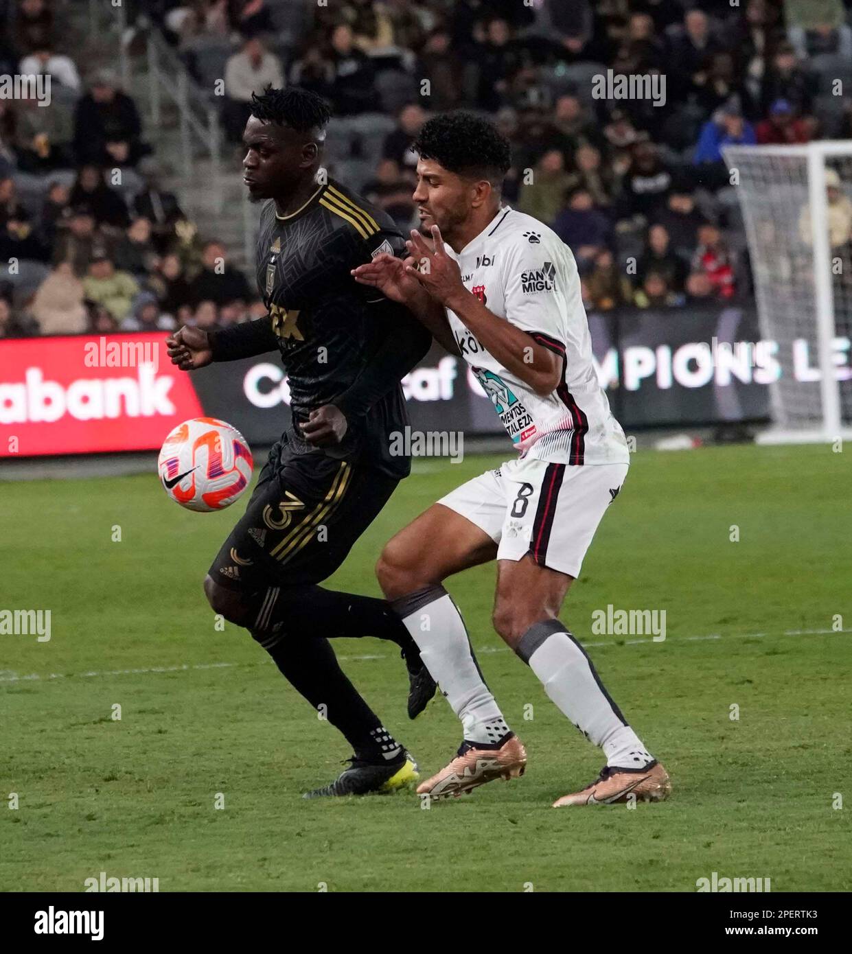 March 15, 2023: LAFC defender Jesus Murillo is pressured by forward ...