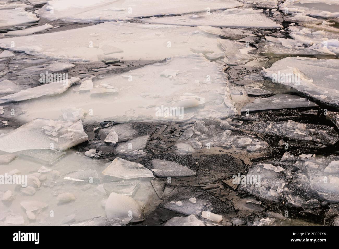 Real pretty white ice and dark water at cloudy winter air Stock Photo ...