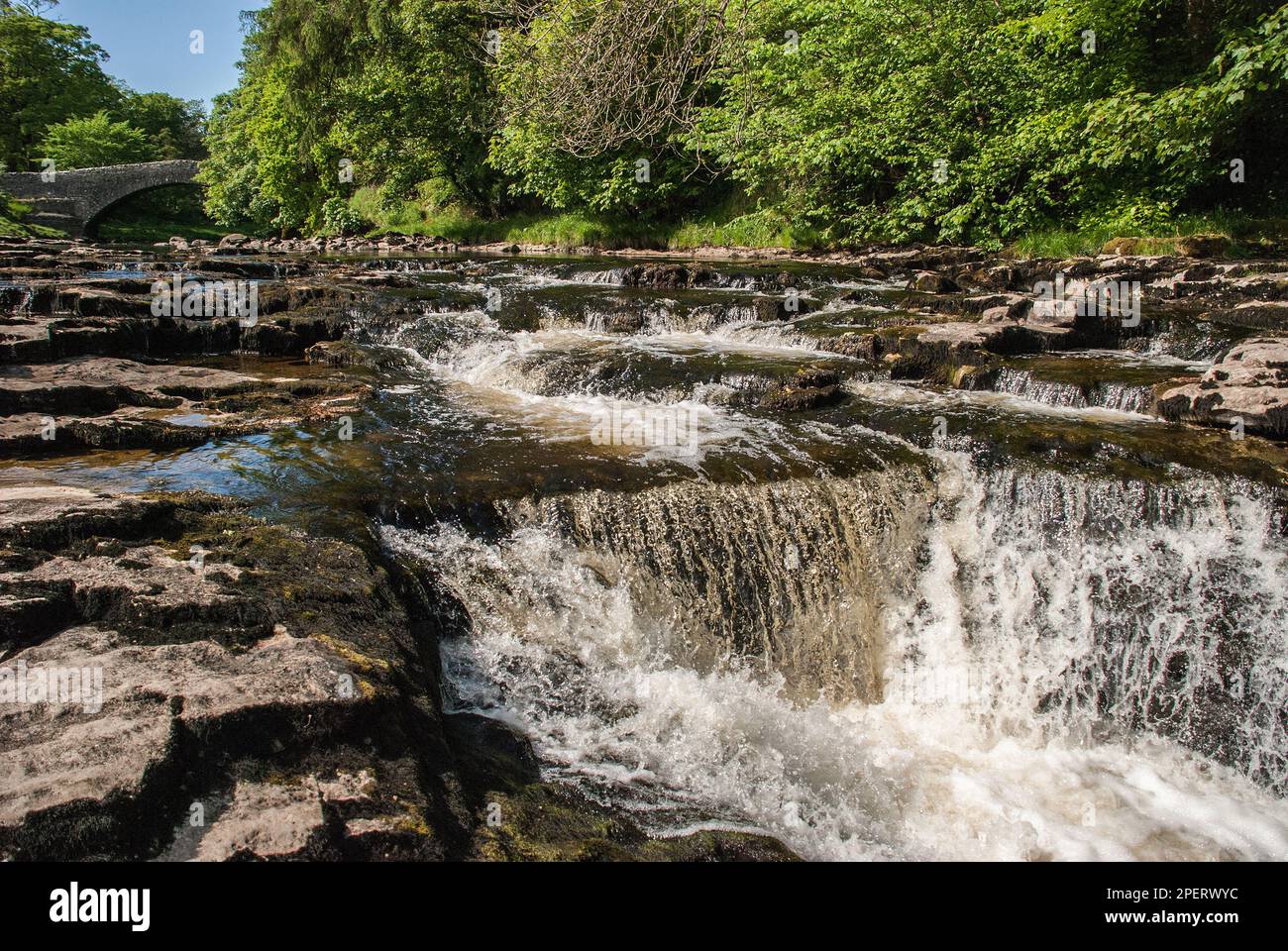 Stainforth Force )or Foss) and the packhorse bridge at Stainforth ...