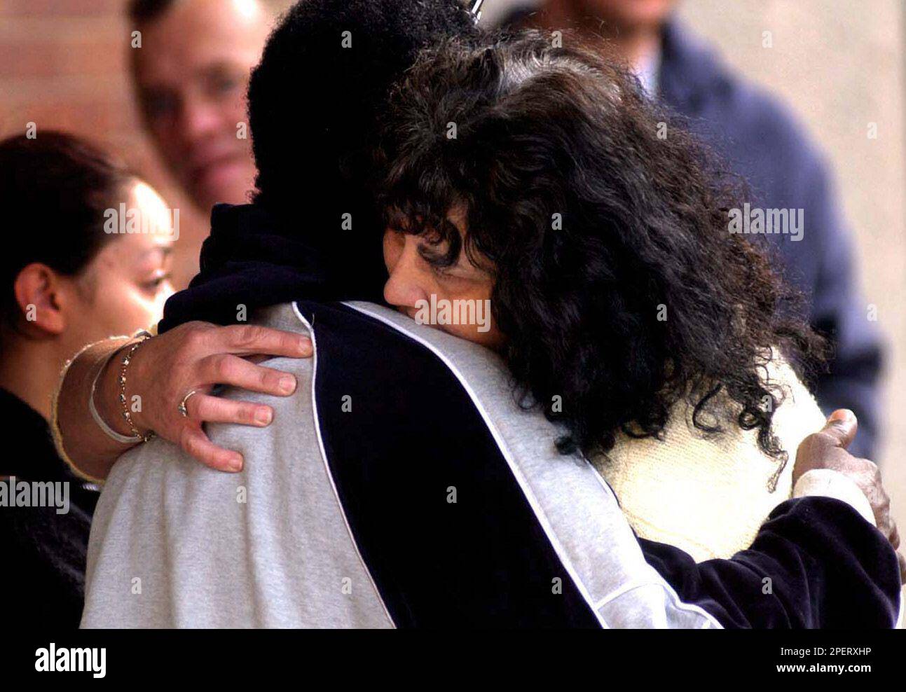 Nancy Self, right, and her boyfriend Kenneth Ketter, comfort each other ...