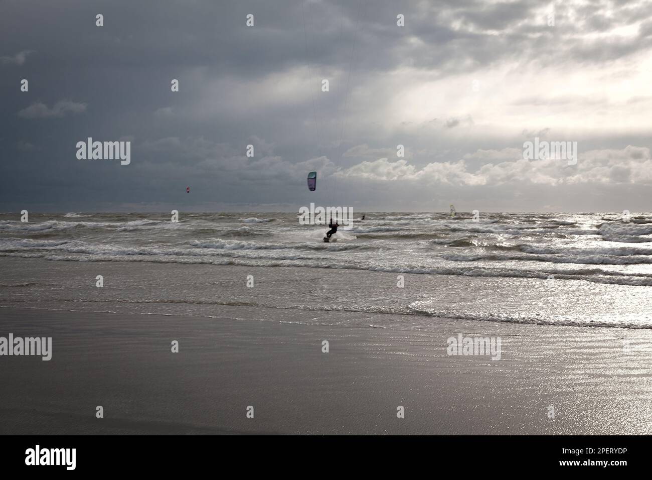 Kitesurfing off the western coast of Denmark Stock Photo - Alamy