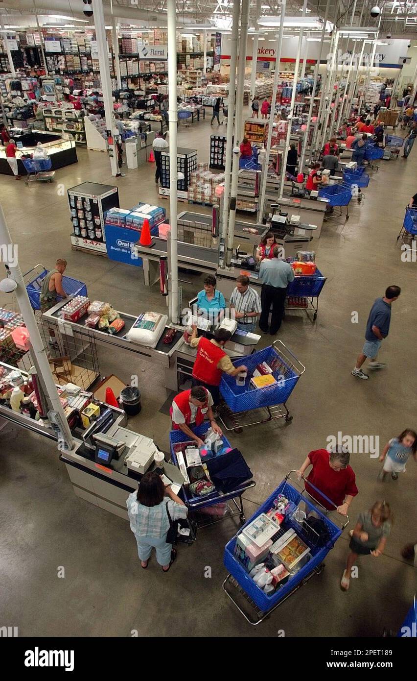 Sam's Club shoppers go through the check out at a Little Rock, Ark ...