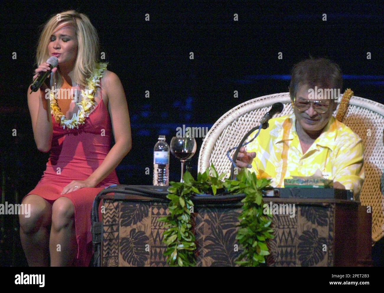 Hoku Ho, left, sings as her father, Don Ho, plays the organ at a gala ...