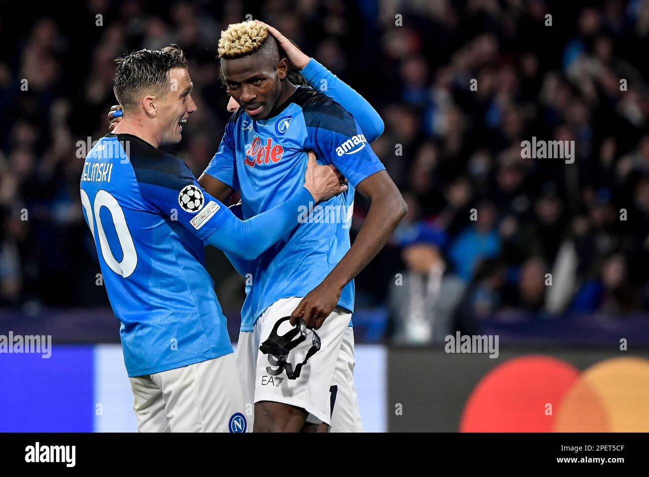 Victor Osimhen of SSC Napoli (r) celebrates with Piotr Zielinski after ...