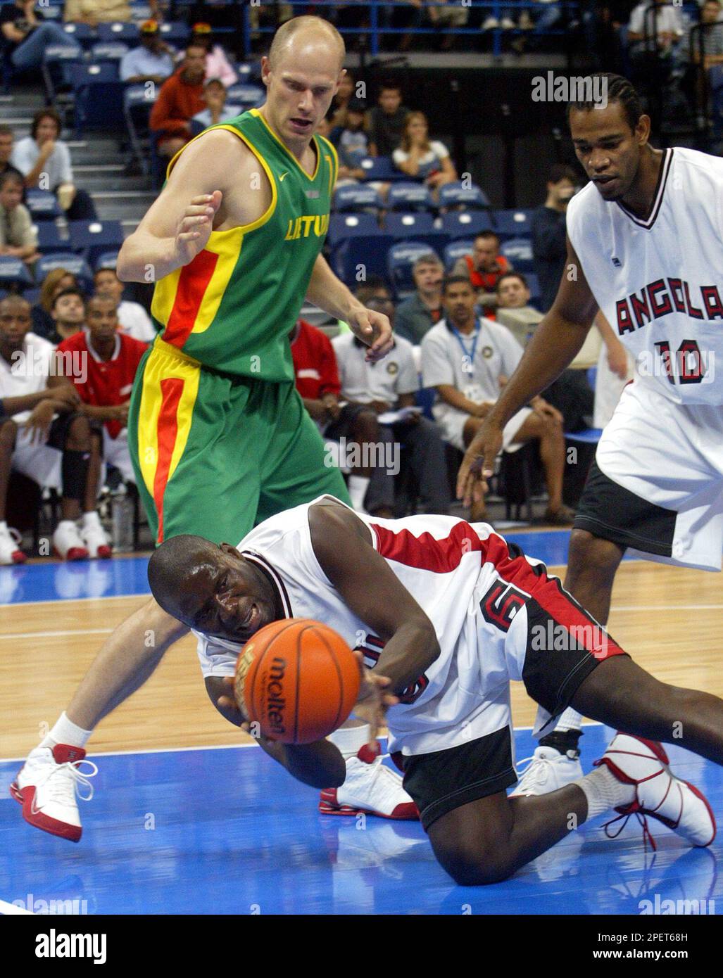 Saulius Stombergas, left, of Lithuania, watches Angelo Monteiro Dos ...