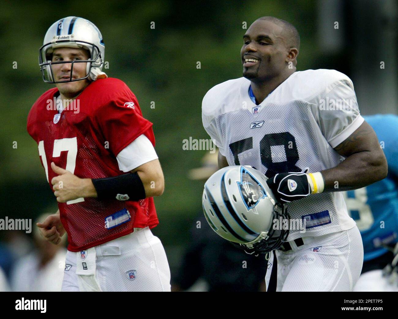 Carolina Panthers linebacker Mark Fields (58) and quarterback Jake ...