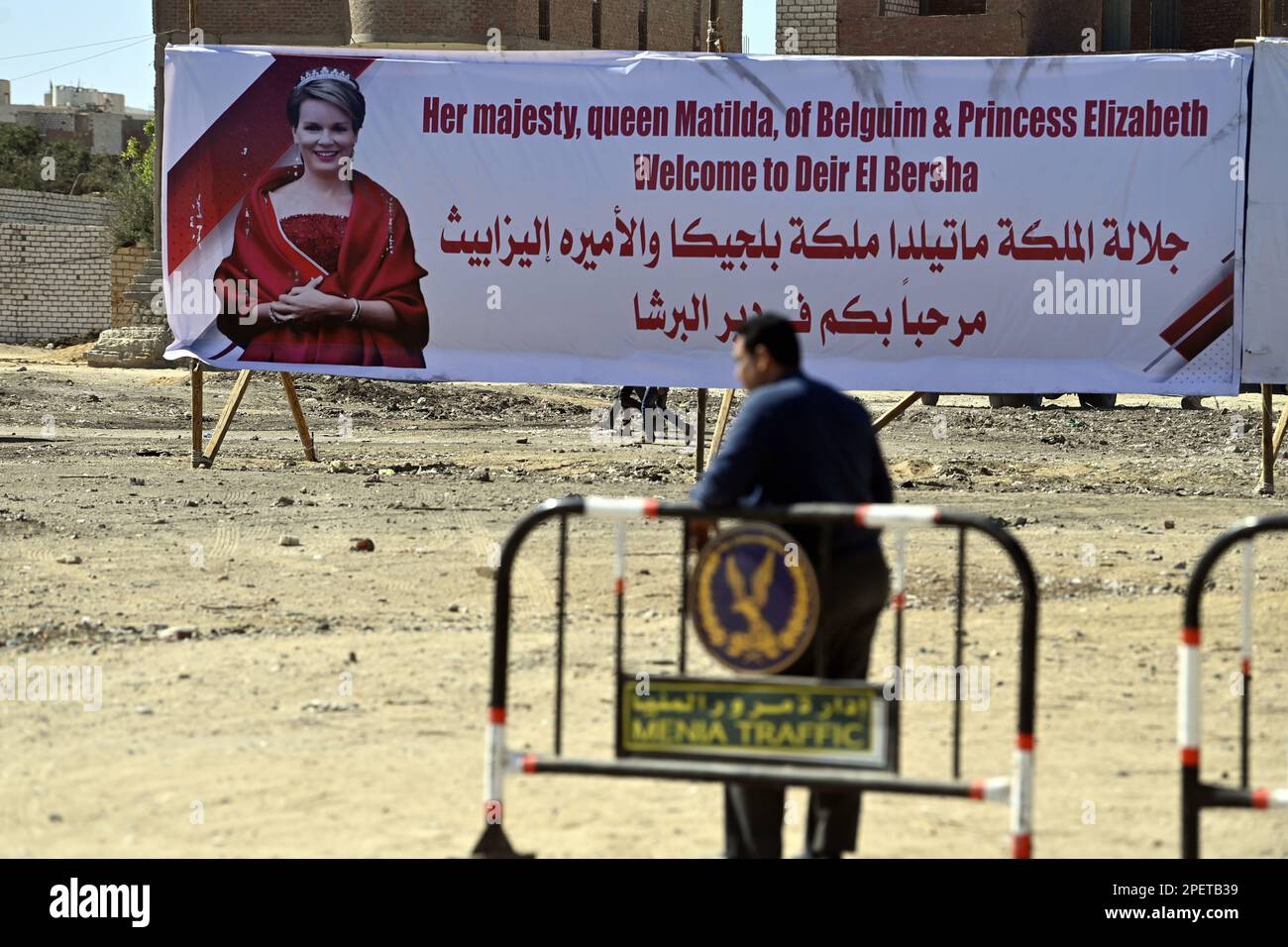 A large poster saying 'Her majesty, Queen Mathilda of Belgium ...