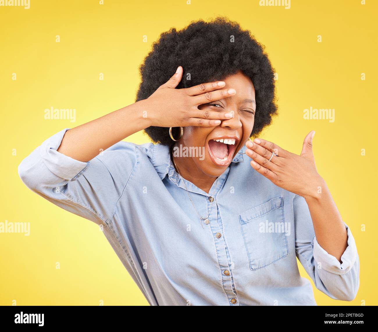 Excited black woman surprised hand on face and shocked winning person ...