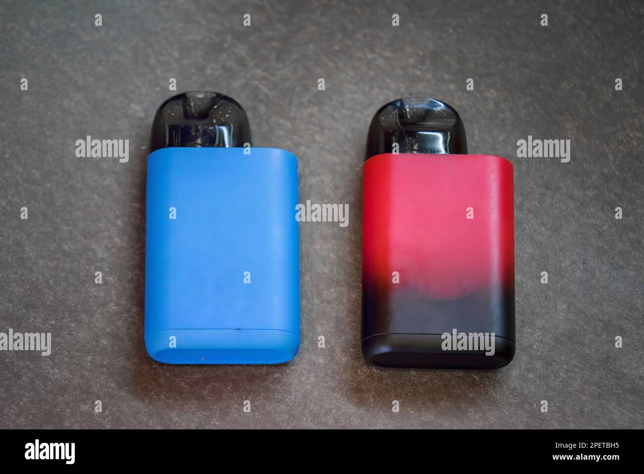 Two electronic cigarettes disposable and refillable with a replaceable ...