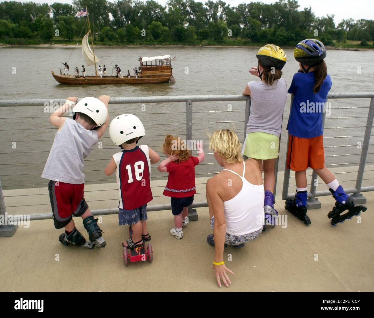 Jenny Peters, right center, watches a replica Keelboat Wednesday July ...
