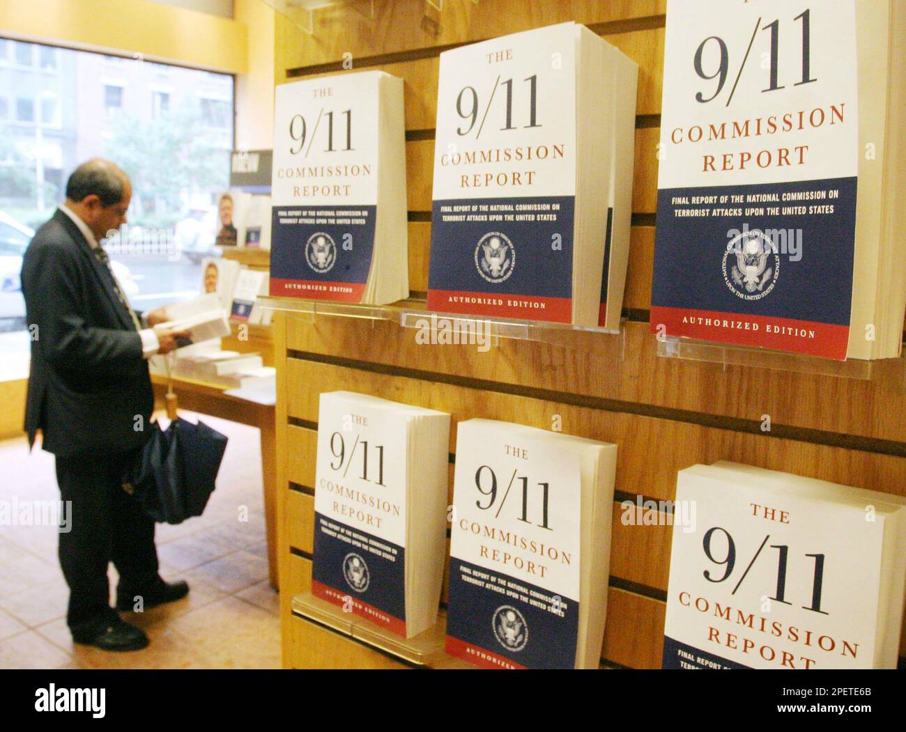 Copies of "The 9/11 Commission Report" are seen on display for sale at ...