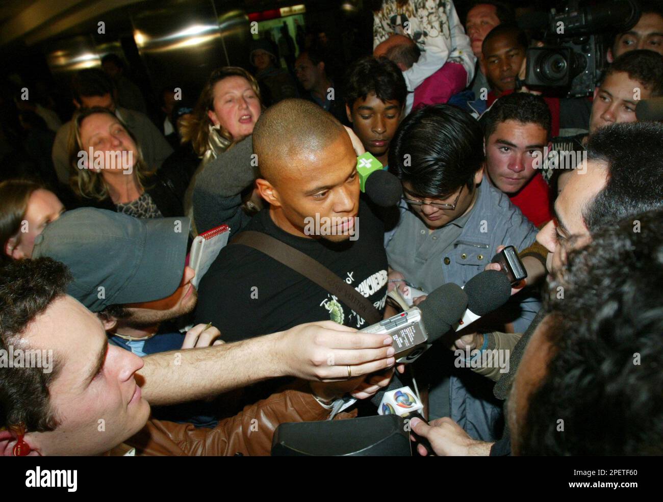 Brazilian player Julio Batista arrives at the airport in Sao paulo ...
