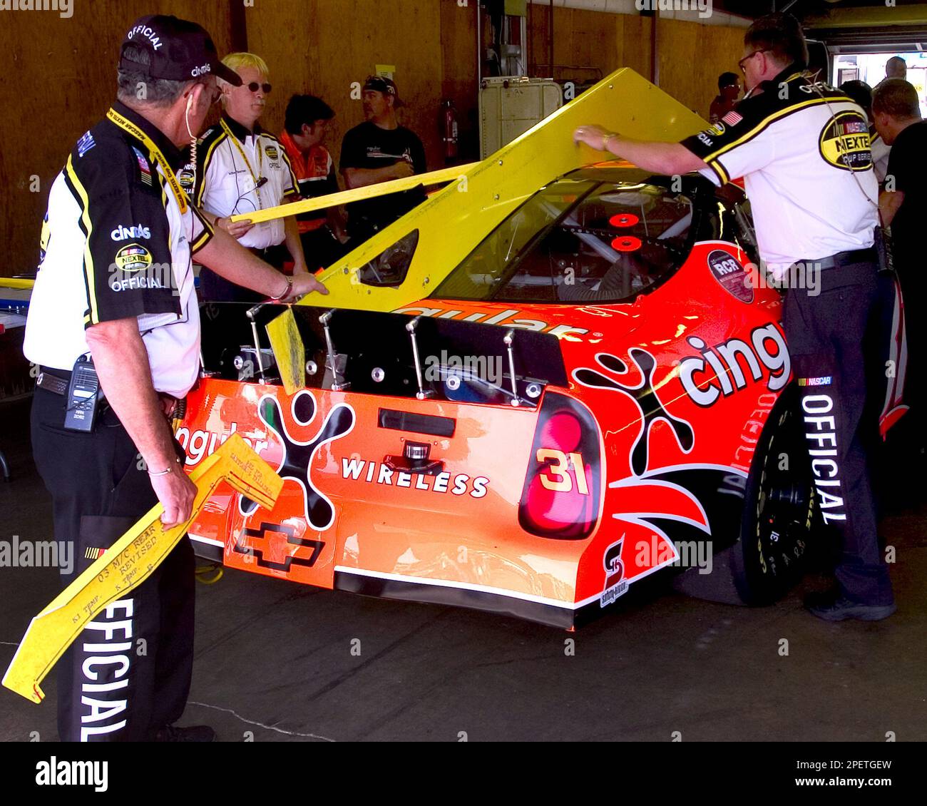 NASCAR tech and safety inspection officials check the Cingular Wireless ...