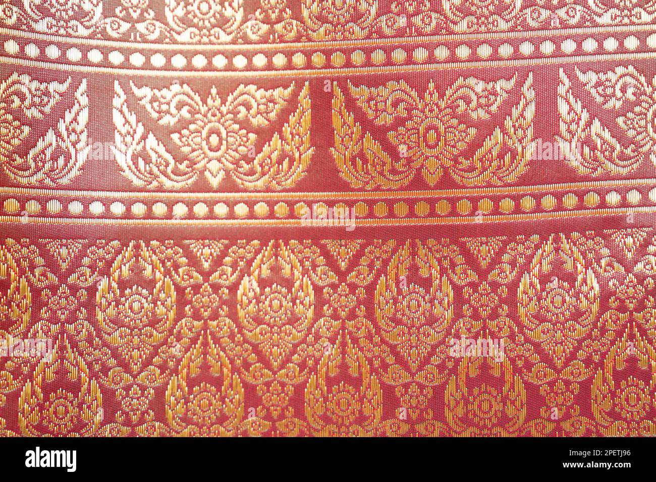 Thai style pattern fabric close up background Stock Photo - Alamy