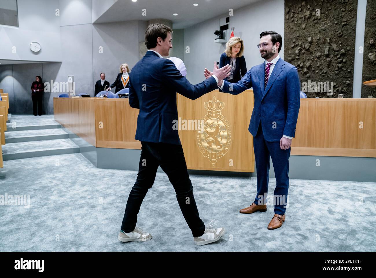 THE HAGUE - Laurens Dassen (VOLT) congratulates Ernst Boutkan, who has ...