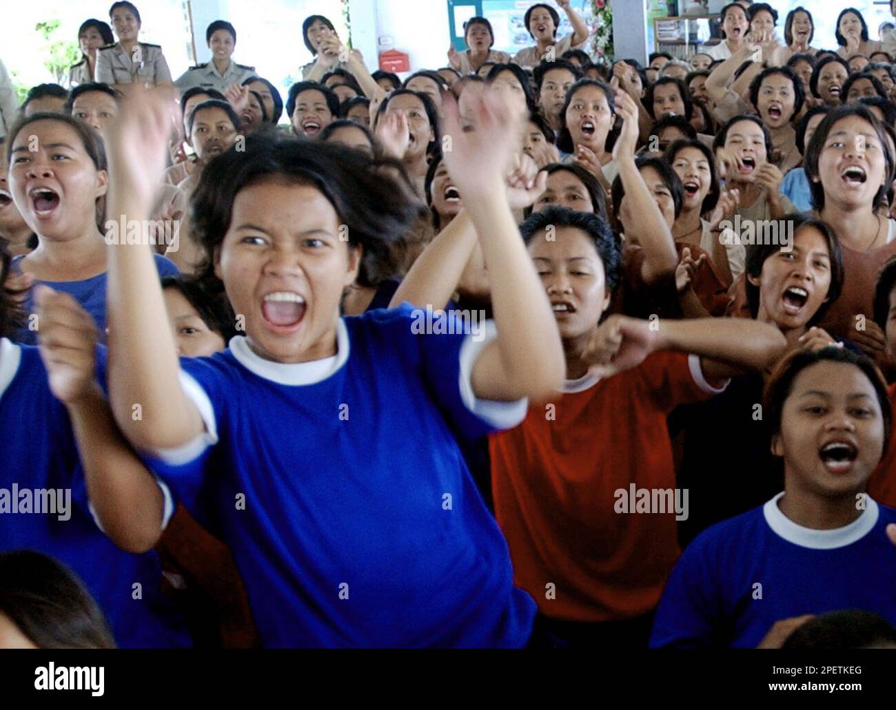 Women inmates cheer their boxer during the woman prisoners boxing ...