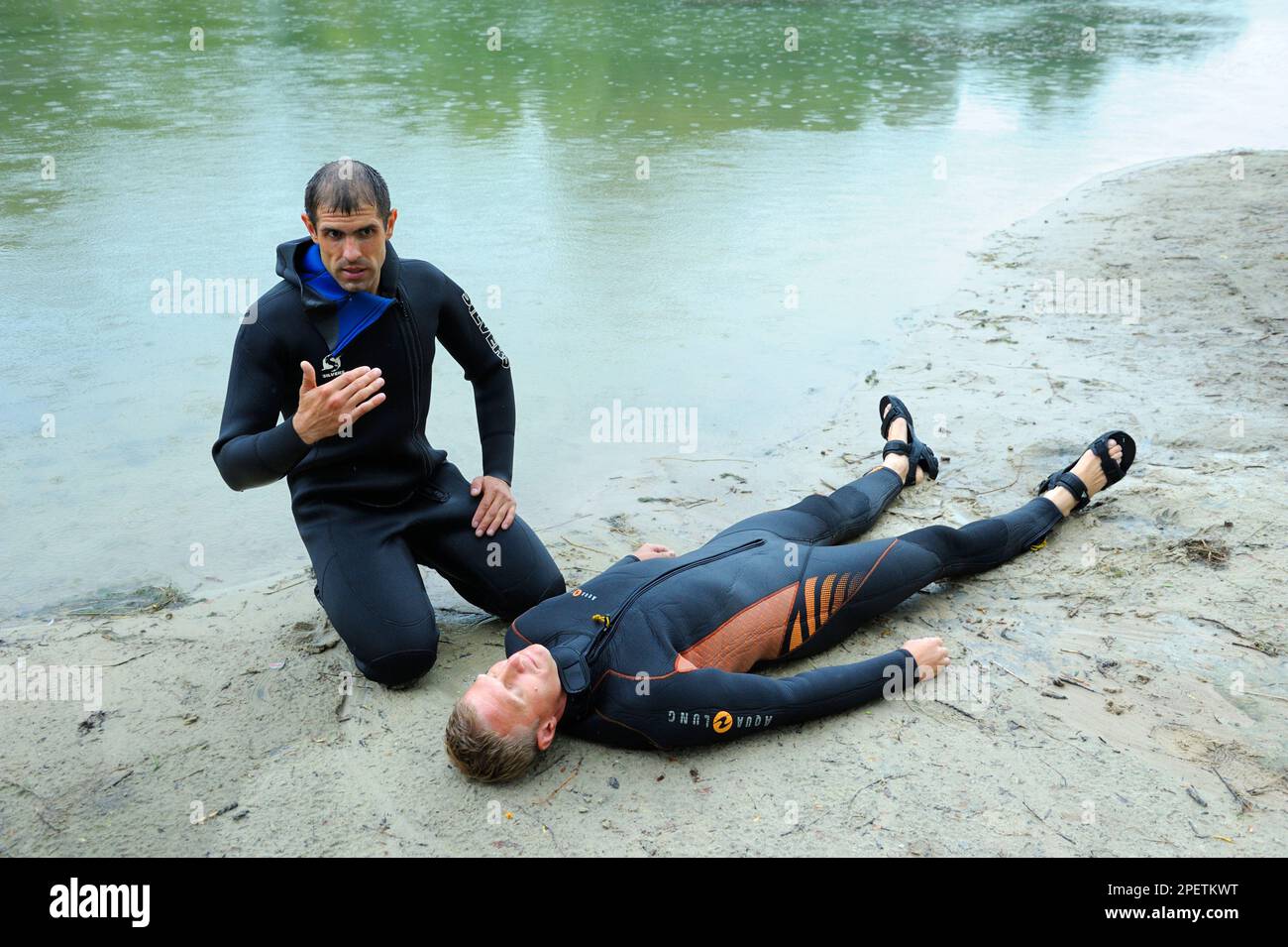 Lifeguards showing position of drowning body before doing mouth-to ...