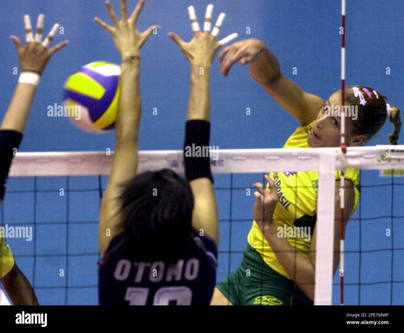 Brazil's Gattaz Caroline spikes the ball past Japan's Ai Otomo during ...