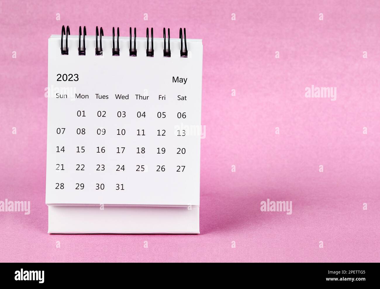 May 2023 desk calendar on pink color background Stock Photo - Alamy