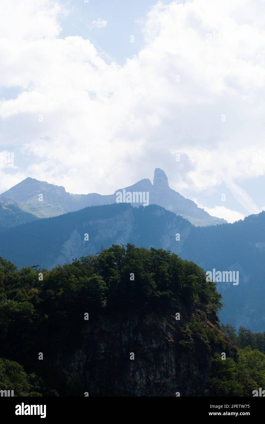 View on hills in mountains in Alps Stock Photo - Alamy