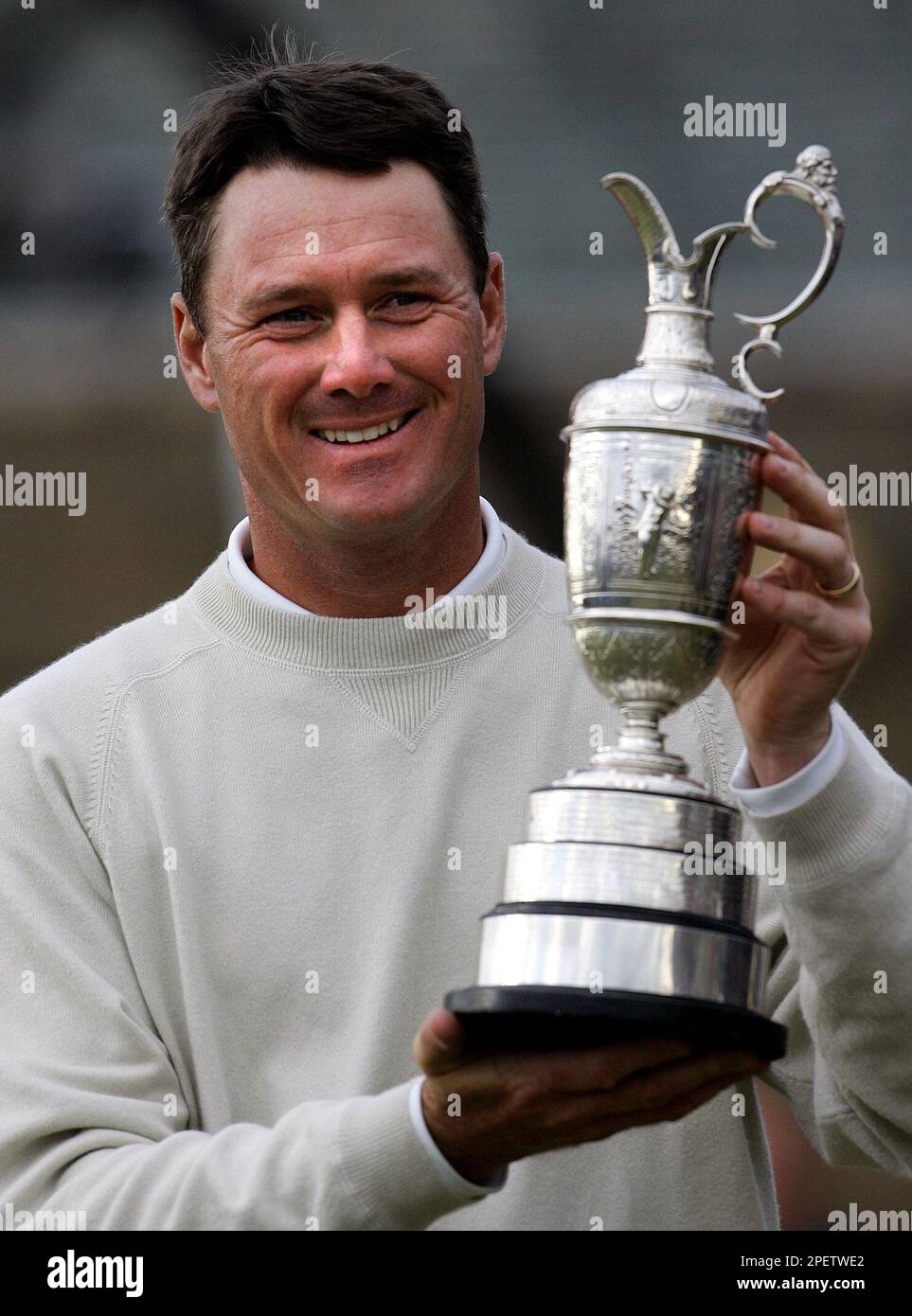 Todd Hamilton of the United States holds the trophy after winning the ...