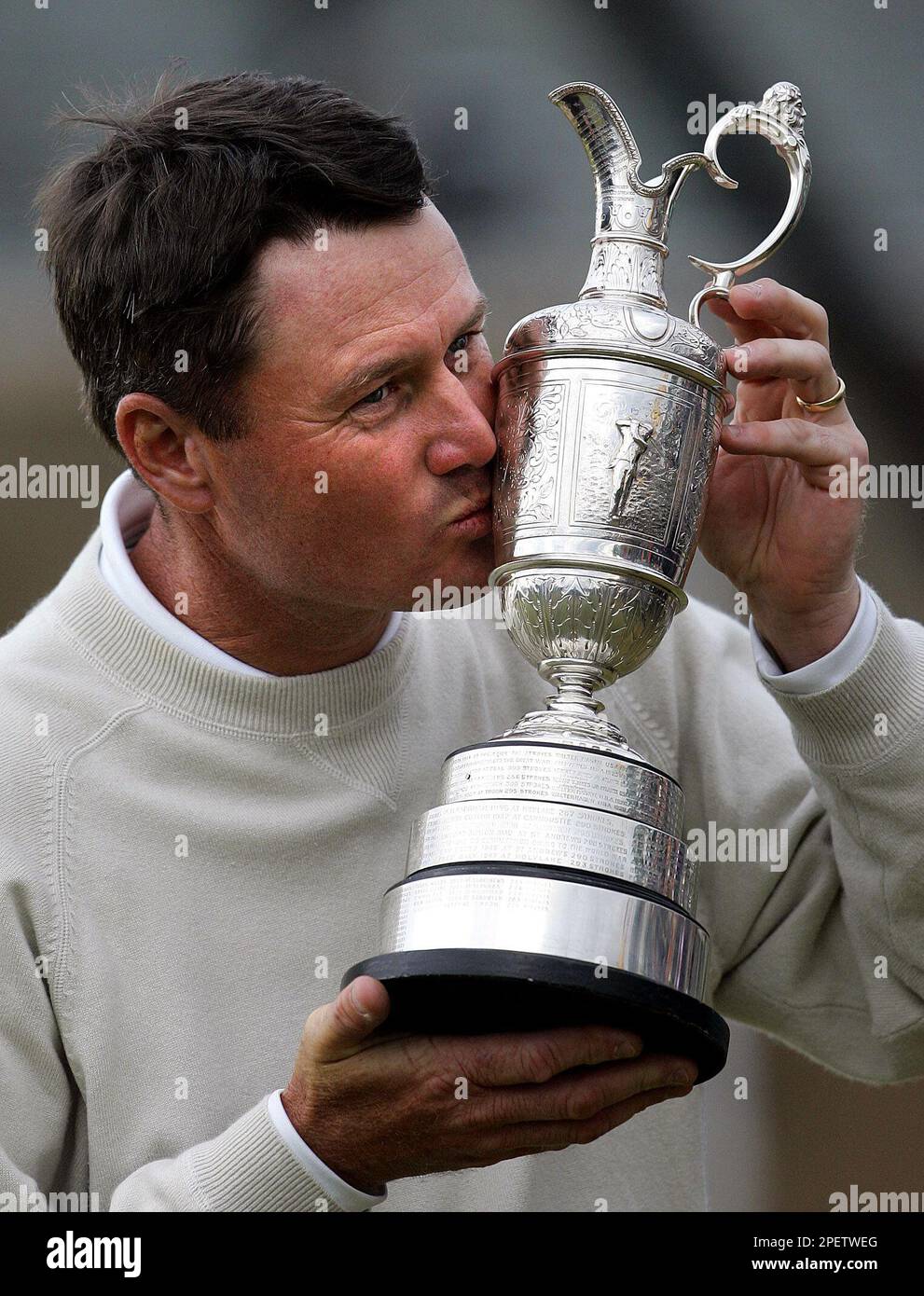 Todd Hamilton of the United States kisses the trophy after winning the ...